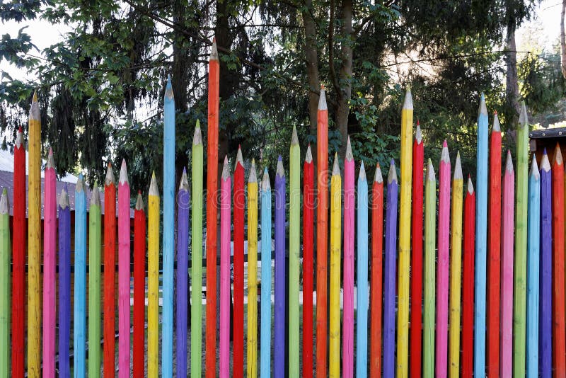 Funny Fence Painted As Pencils Stock Image - Image of funny, blue: 59967313