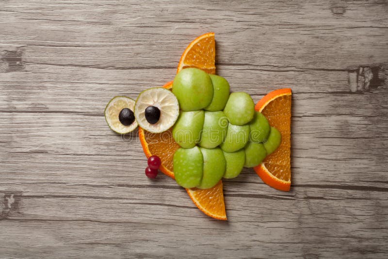 Funny fish made of fruits stock photo. Image of humor - 74850566
