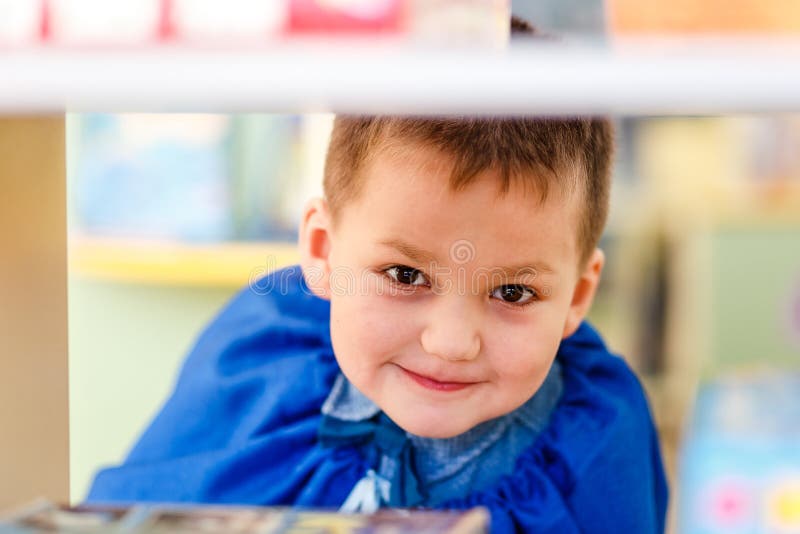 Funny Five-year Girl Sitting Rolled Down an Ice Slide Stock Photo ...