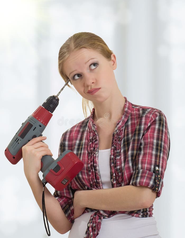 Girl with drill stock image. Image of hard, handywoman - 2168683