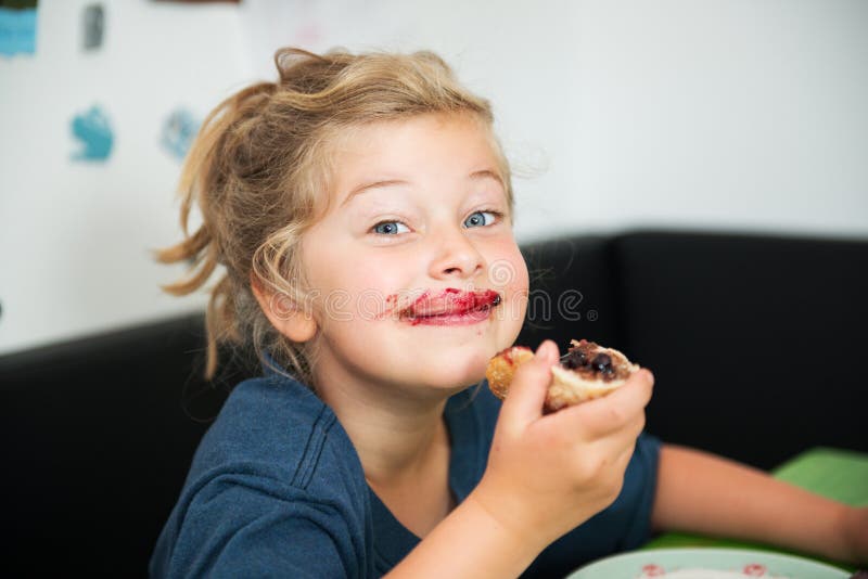 Funny Girl Eating Bread Roll with Marmelade Stock Photo - Image of ...