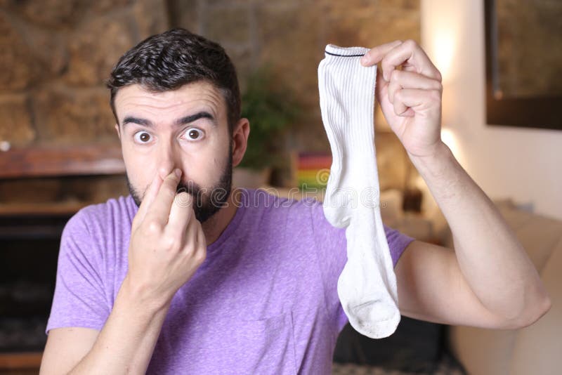 Funny Guy Smelling Sock with Fungus Stock Photo - Image of foot ...