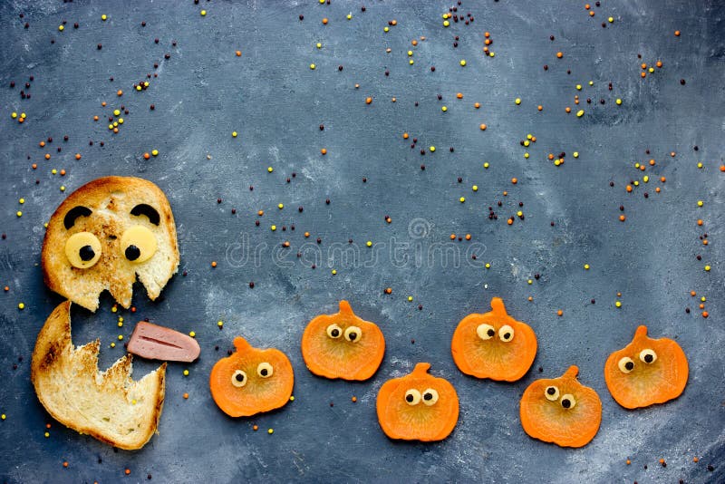 Funny Halloween Food Background Bread Monster Eatsl Pumpkin Stock Image ...