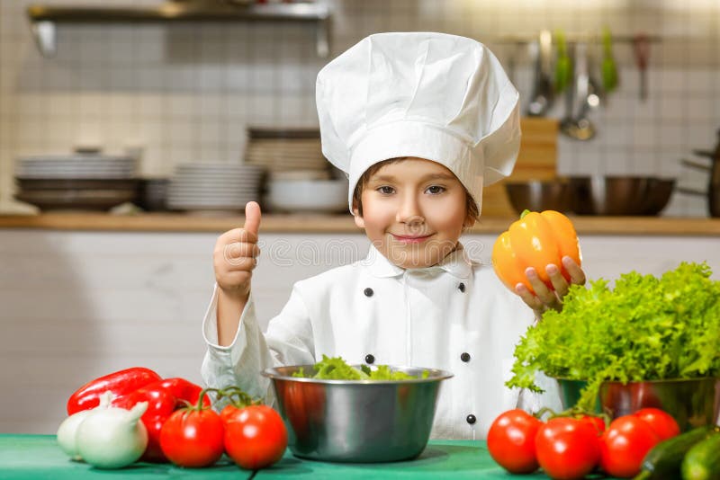 Funny Happy Chef Boy Holding Bell Pepper or Stock Photo - Image of ...