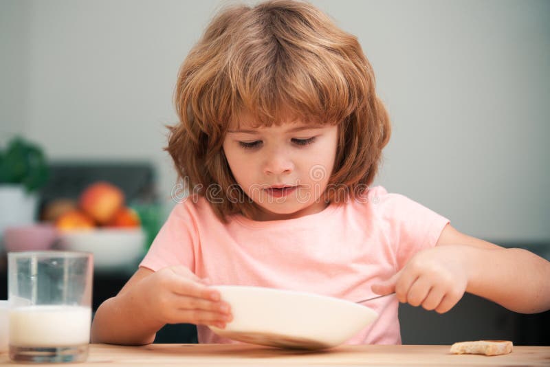 Funny Kid with Plate of Soup. Child Eating Dinner. Stock Image - Image ...