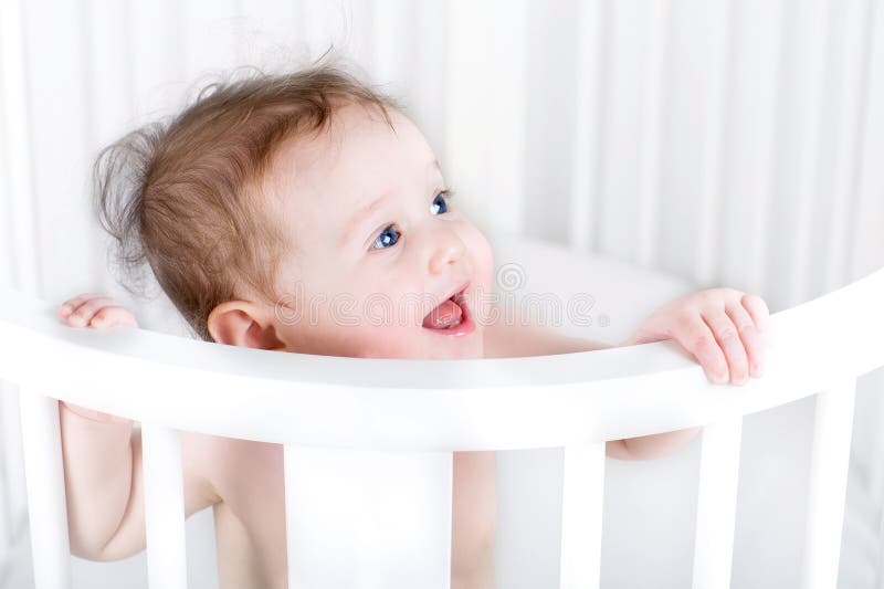 Funny Little Baby in a White Round Crib Stock Photo - Image of health ...