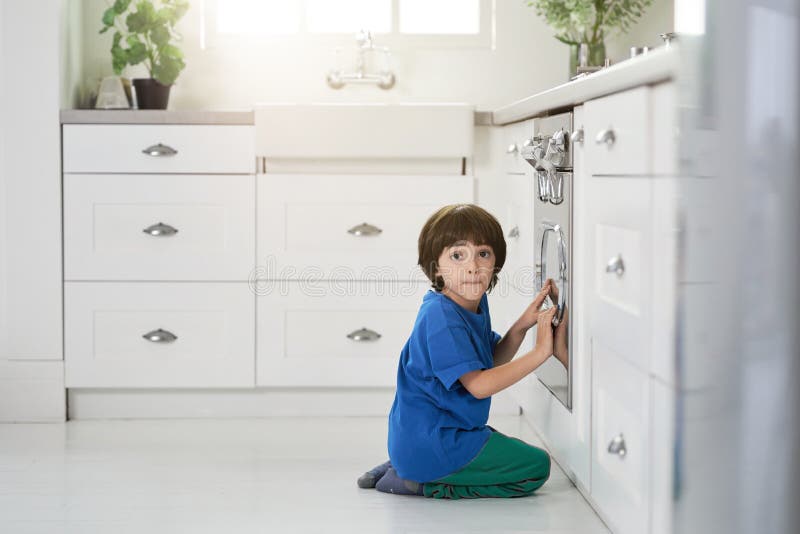 Little boy crouching stock image. Image of family, cute - 432301