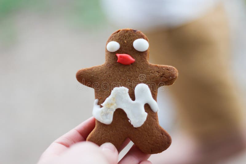 Funny Looking Gingerbread Man with Smudged Icing Stock Image - Image of ...