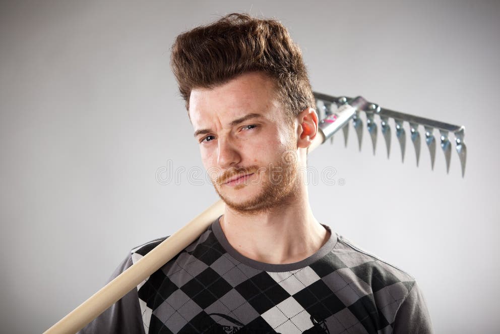 Funny Looking Guy with Red-haired with a Rake Stock Image - Image of ...