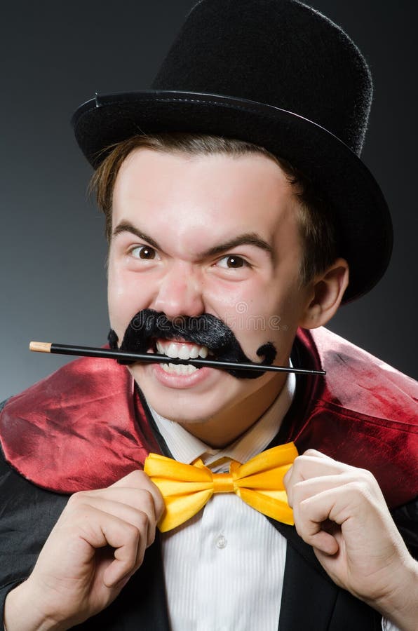 Funny magician with wand stock image. Image of show, adult - 44750119