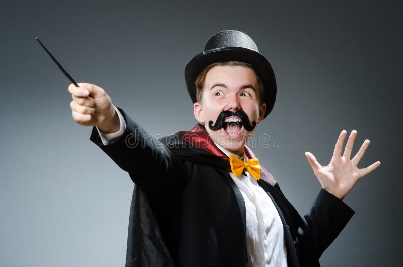 Funny magician with wand stock image. Image of conjuror - 45046859