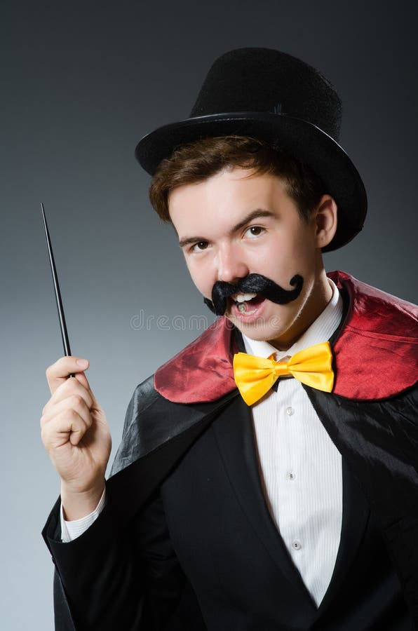 Funny magician with wand stock image. Image of male, show - 45679091