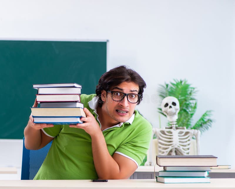 Funny Male Student in the Classroom with Skeleton Stock Image - Image ...