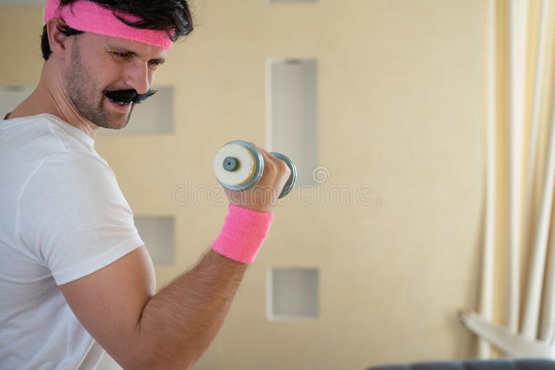 Funny Man Athlete Doing Exercise with Lightweight Dumbbell at Home ...