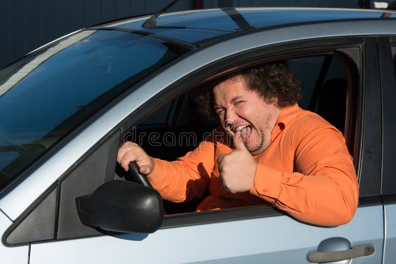 Funny fat man in the car. stock photo. Image of madre - 114846472