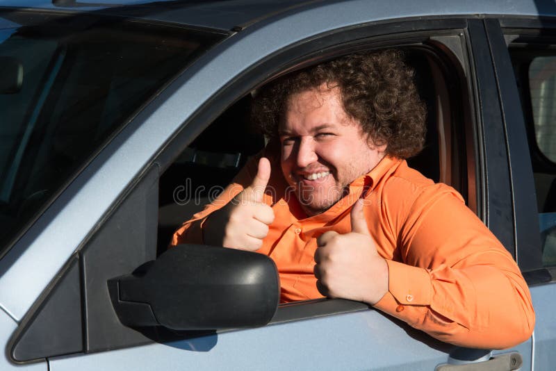 Funny fat man in the car. stock image. Image of funny - 114846511