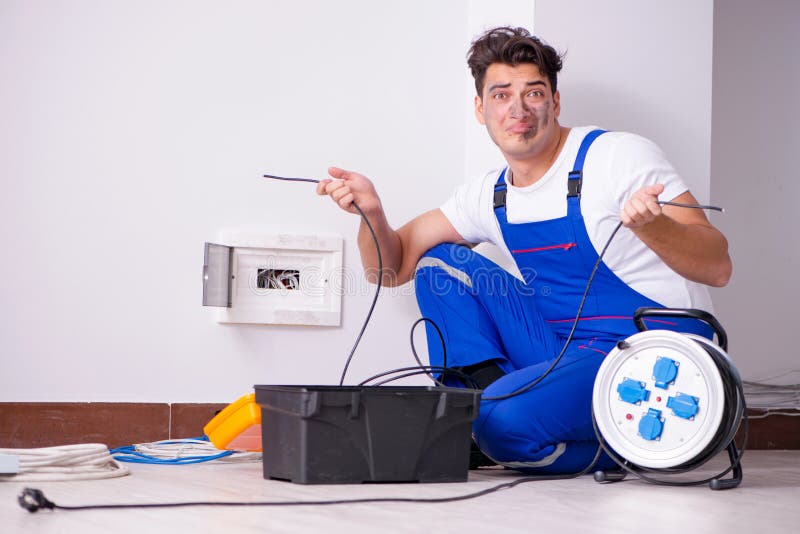 The Funny Man Doing Electrical Repairs at Home Stock Photo - Image of ...