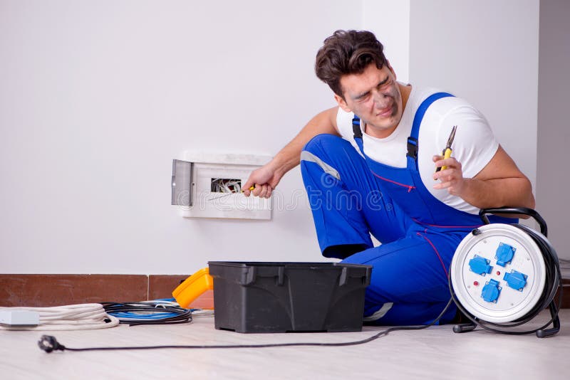 The Funny Man Doing Electrical Repairs at Home Stock Photo - Image of ...