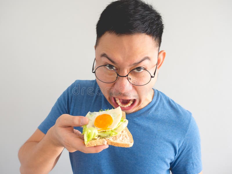 Funny man eat sandwich. stock image. Image of cuisine - 86787423