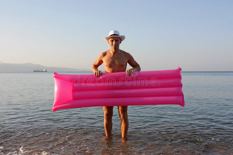 Funny Man with Inflatable Mattress Stock Image - Image of body, travel ...
