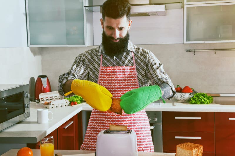 Funny Man Making Toasts for Morning Breakfast Stock Photo - Image of ...