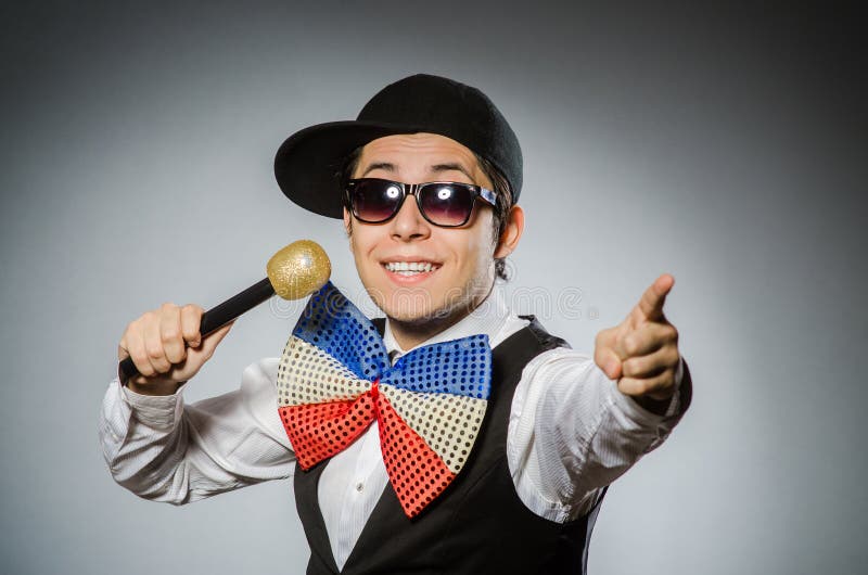 Funny Man with Mic in Karaoke Concept Stock Photo - Image of microphone ...