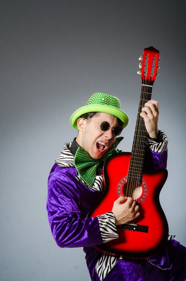 The Funny Man Playing Guitar in Musical Concept Stock Image - Image of ...