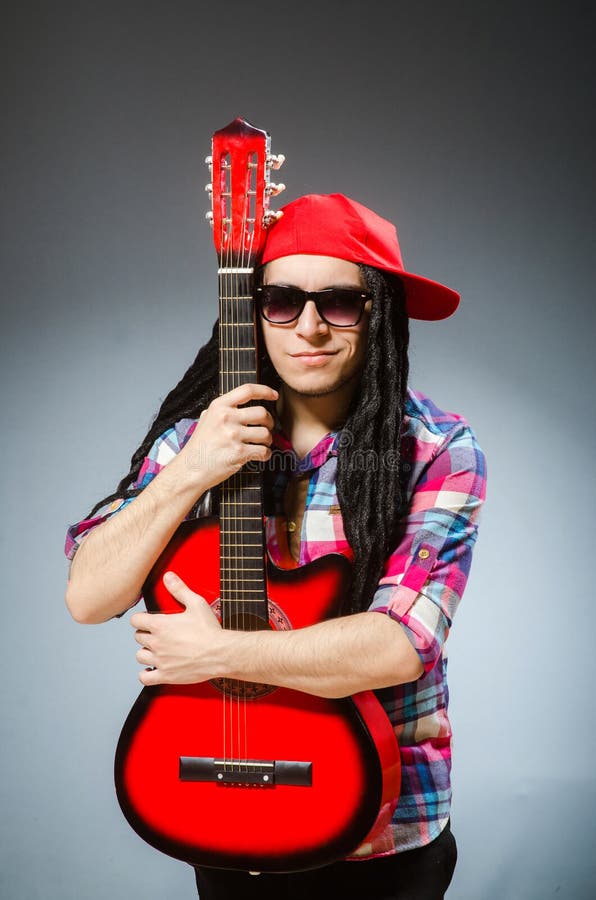 Funny man playing guitar stock image. Image of isolation - 5050209