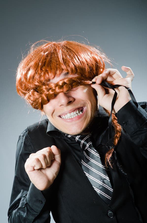 The Funny Man with Red Hair Wig Stock Photo - Image of hair, company ...