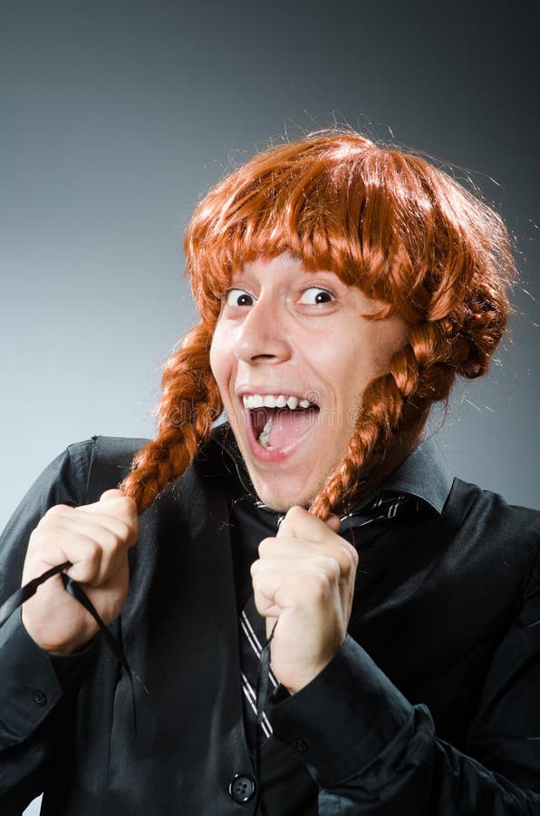 Funny Man with Red Hair Wig Stock Image - Image of dark, employer: 70953803