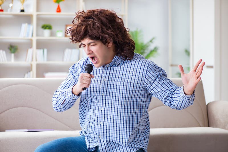 The Funny Man Singing Songs in Karaoke at Home Stock Photo - Image of ...