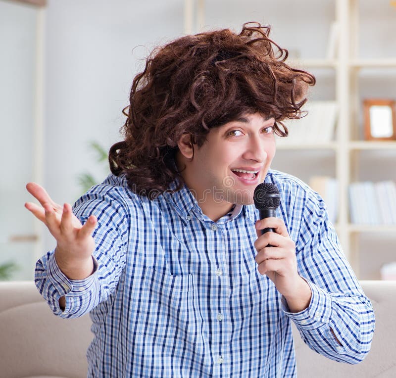 Funny Man Singing Songs in Karaoke at Home Stock Photo - Image of ...