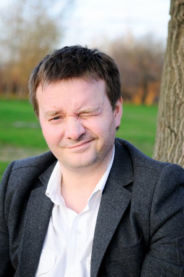 Funny man winking stock photo. Image of curious, happiness - 19552838