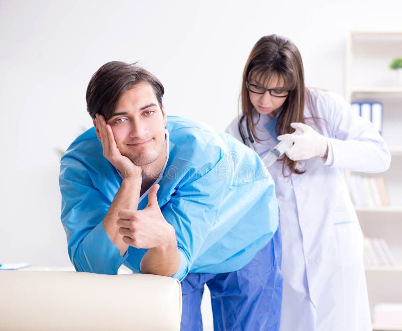 Funny Man Getting Ready for Buttocks Syringe Shot Stock Photo - Image ...