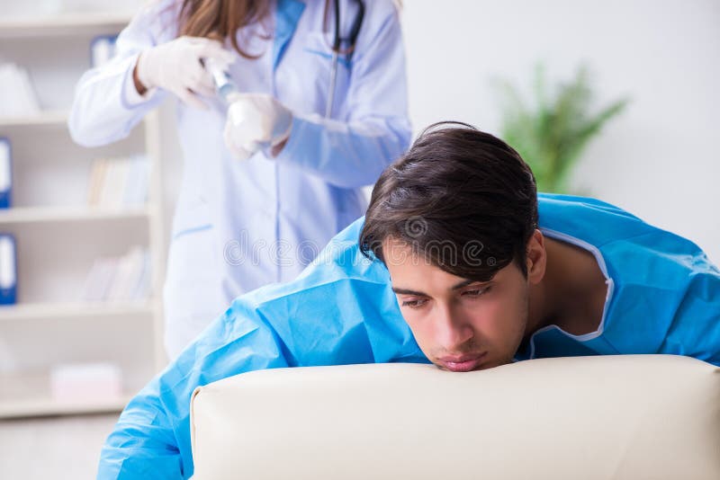 The Funny Man Getting Ready for Buttocks Syringe Shot Stock Image ...