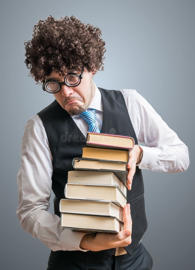 Nerd guy with books stock image. Image of geek, person - 37677157