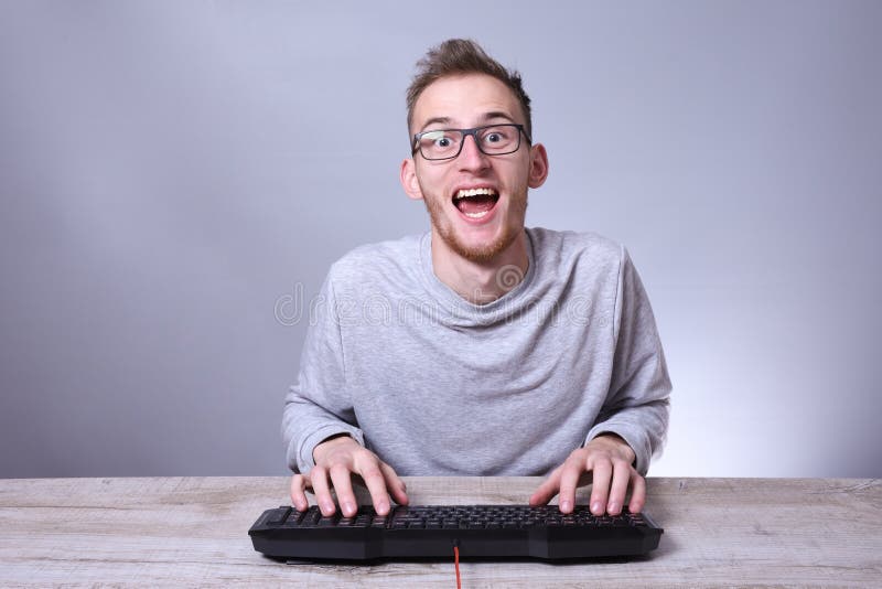 Funny Nerd Young Businessman, Man Working on Computer.Typing on the ...