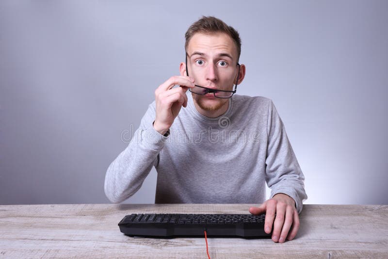 Funny Nerd Young Businessman, Man Working on Computer.Typing on the ...