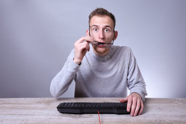 Funny Nerd Young Businessman, Man Working on Computer.Typing on the ...