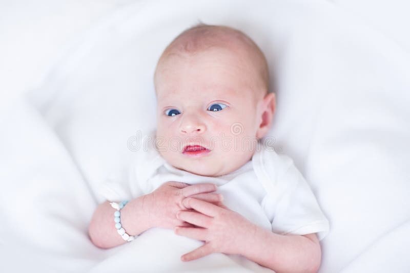 Funny Newborn Baby on a White Blanket Stock Photo - Image of infant ...