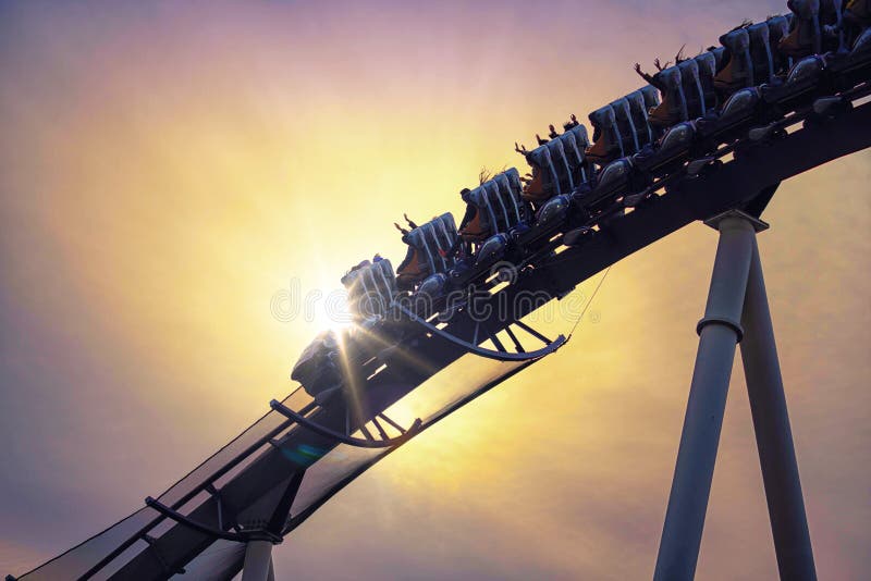 Funny People Riding Roller Coaster with Sun Light Stock Photo - Image ...