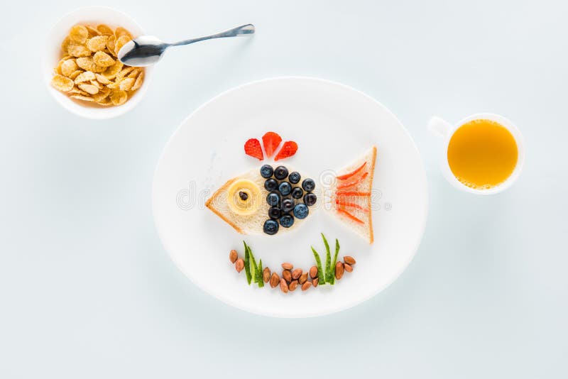 Funny Sandwich in Shape of Fish and Cereal Flakes for Breakfast Stock ...