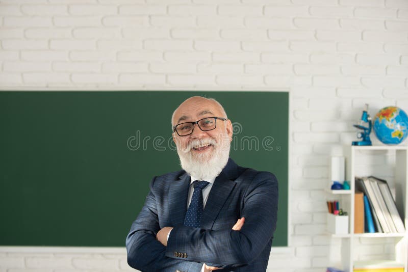 Funny Senior Professor Portrait Of Happy Senior Teacher With Arms