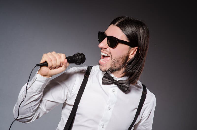 Funny Singer with Microphone Stock Photo - Image of live, karaoke: 44545950