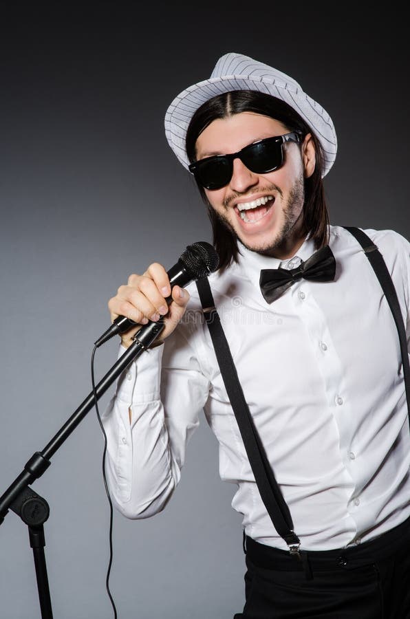 Funny Singer with Microphone Stock Photo - Image of scream, discoteque ...