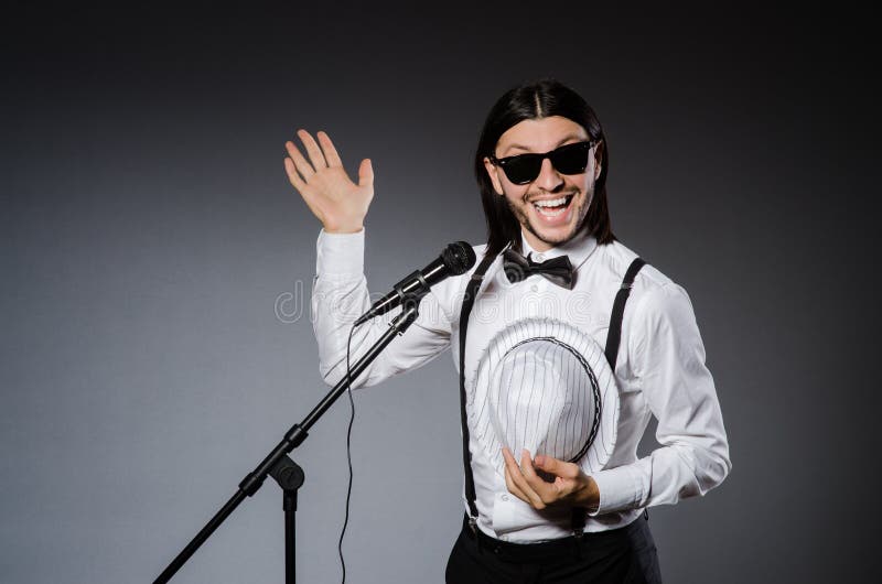 Funny Singer with Microphone Stock Image - Image of performance, club ...