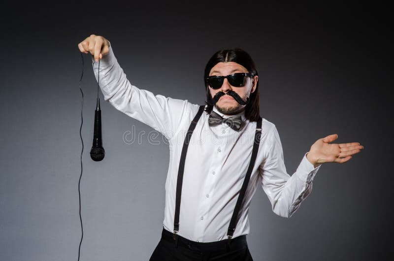 Funny Singer with Microphone Stock Photo - Image of performance ...