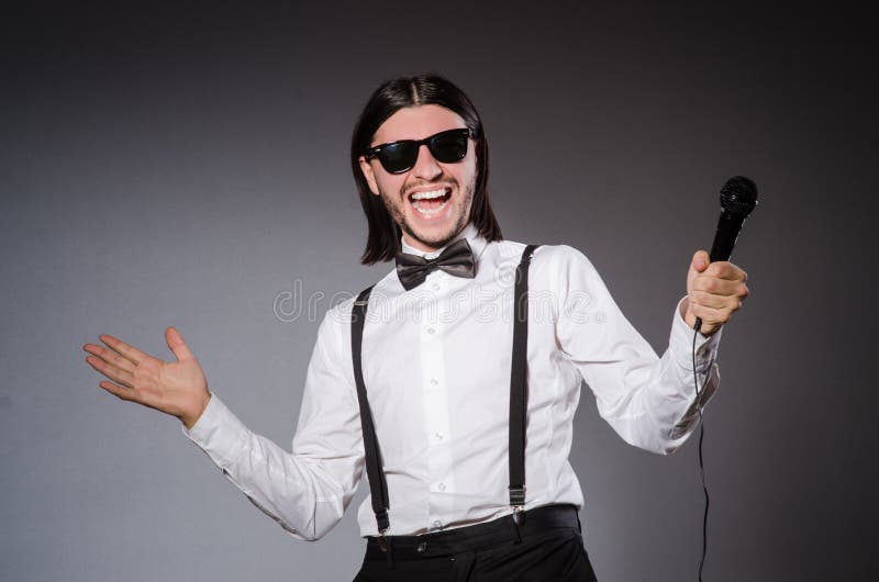 Funny Singer with Microphone Stock Photo - Image of show, isolated ...