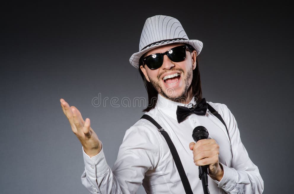 Funny Singer with Microphone Stock Image - Image of hair, musician ...