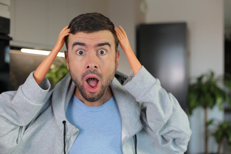 Funny Surprised Looking Man Using Small Toy Plastic Arms Stock Photo ...